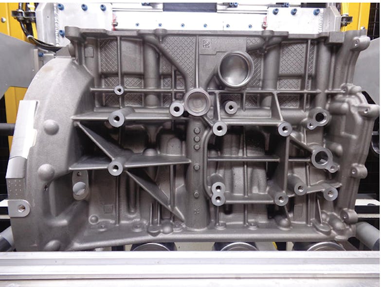 Robot-carried vision system inspects engine block surfaces | Vision ...